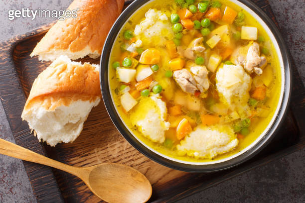 Croatian homemade chicken soup with vegetables and semolina dumplings ...