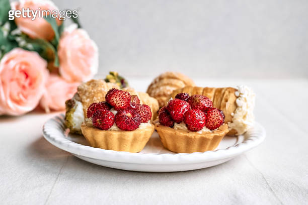 Delicious tartlets dessert assorted pastries. Mini tartlets with cream ...