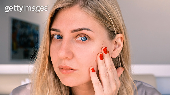 Second chin, obesity. A portrait of a 30-year-old woman pulling back ...