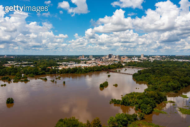 Jackson, MS Skyline with flooding Pearl River in the foreground in ...