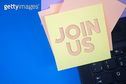 Join Us. Text on adhesive note paper. Event, celebration reminder ...