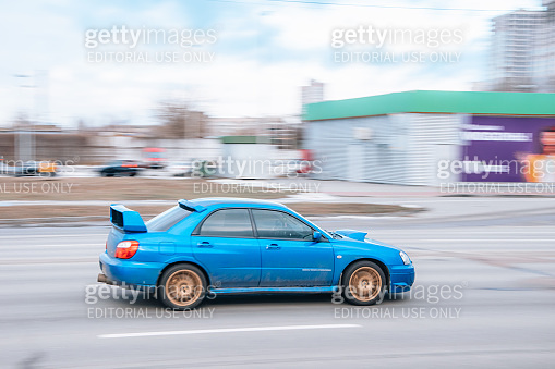 Light Blue Subaru Impreza WRX STi car moving on the street. (1372047706 ...