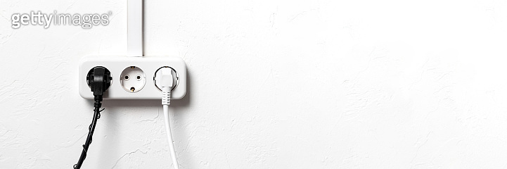 Electrical outlets with two plugs on white wall banner 이미지 (1405606815 ...