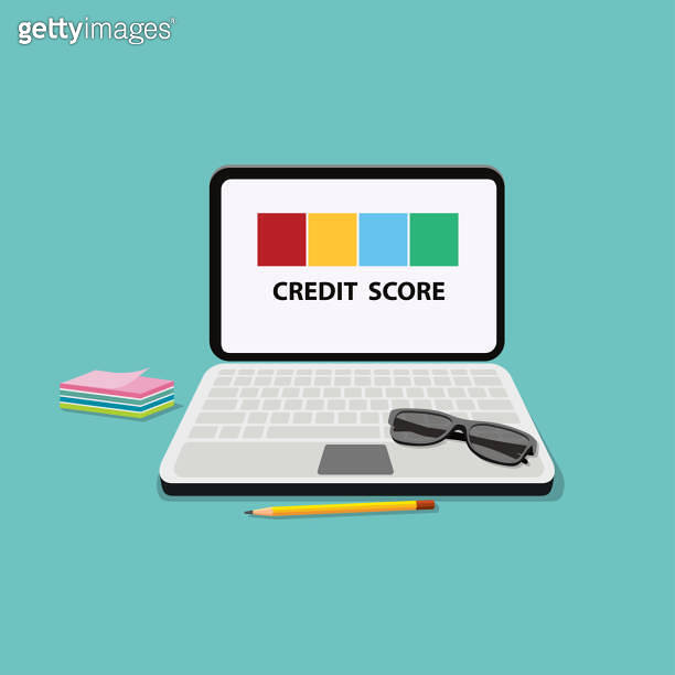 credit score,Office desktop with pencil ,glasses,notepaper and laptop ...