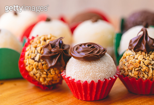 Brazilian gourmet brigadeiro in close-up photography. Brazilian food ...