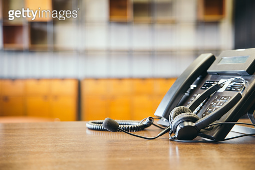 Headset and customer support equipment at call center ready for ...
