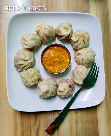 Steam-cooked momos with sauce, Nepalese Traditional Dish Momo ...