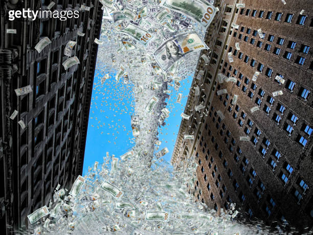Financial crisis concept of money storm in financial district 이미지 ...