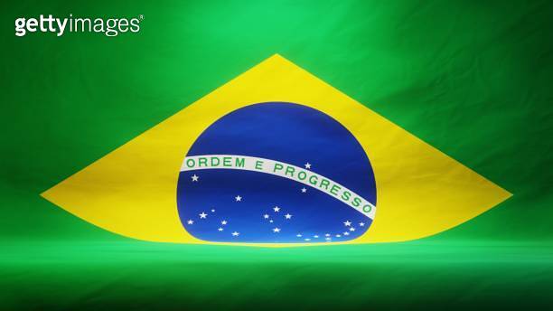 Studio backdrop with draped flag of Brazil for presentation or product ...
