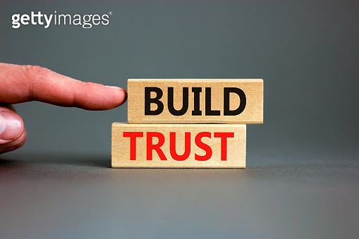 Build trust symbol. Concept words Build trust on wooden blocks on a ...