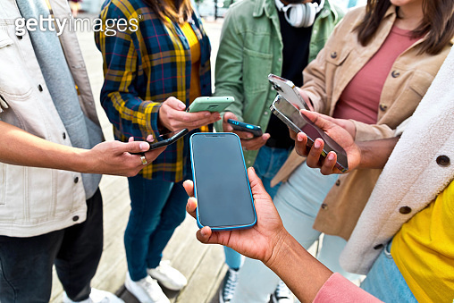 Group of young people using smart mobile phones - Multiethnic group of ...