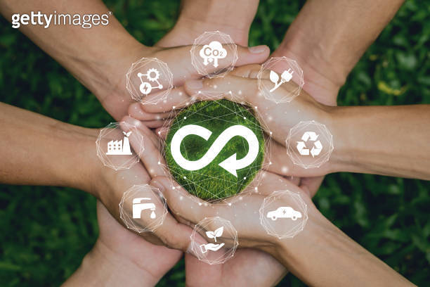 Circular economy concept.Group of poeple holding to wolrd.The concept ...