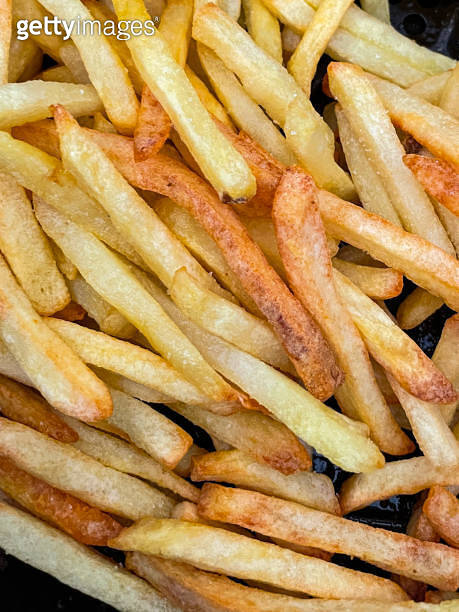 Full frame image of golden brown, fresh crunchy French fries / chunky ...