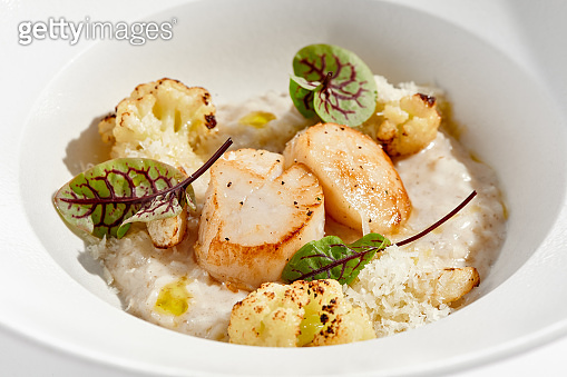 Delicious creamy risotto with sea scallop and cauliflower. Elegant main ...