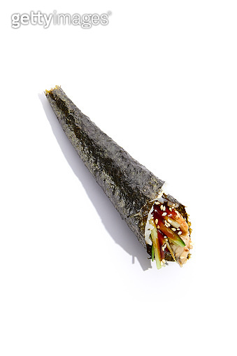 Japanese temaki sushi with eel, cucumber and unagi sauce on white ...