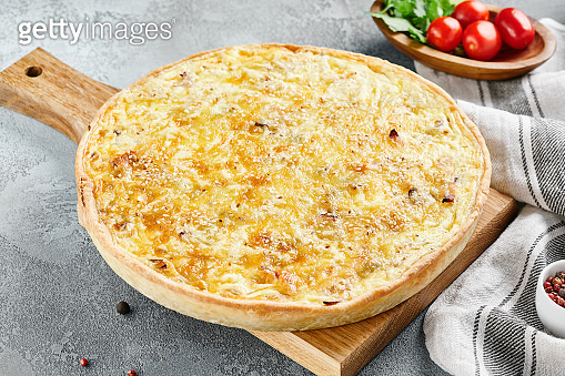 Open pie with mushrooms and cheese. Quiche lorraine with cheese and ...