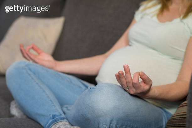 Meditating to Keep Calm in Pregnancy 이미지 (1389355642) - 게티이미지뱅크