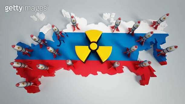 Group of nuclear weapons and radiation symbol on Russia map in Russian ...