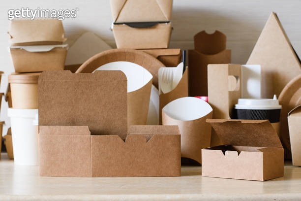Eco-friendly cardboard boxes and food packaging. An example of a ...