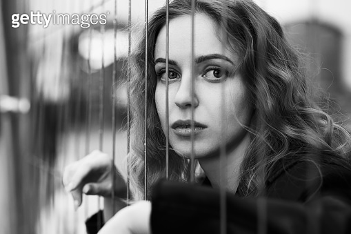 girl behind bars 이미지 (1404246939) - 게티이미지뱅크