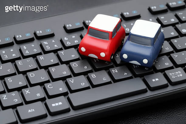 toy car on computer keyboard 이미지 (1372646765) - 게티이미지뱅크