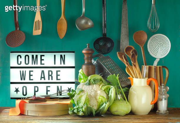 Restaurant open sign with kitchen utensils and vegetables, reopening ...