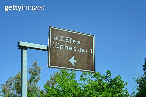 Road sign at a junction to access the ancient ruins of Ephesus ...