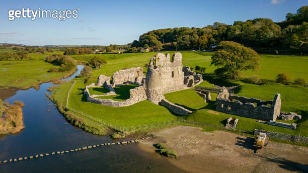 Aerial view of stepping stones crossing a small river leading to an ...
