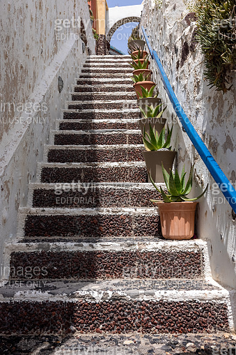 Narrow stone steps in Red beach on the south coast of Santorini island ...