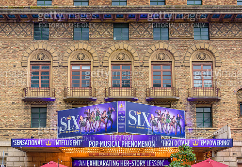 A front view of The Comedy Theatre in Melbourne, adorned with the ...