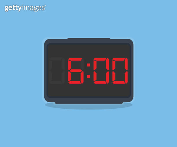 Digital black alarm clock displaying 6:00 o'clock. Digital clock with ...
