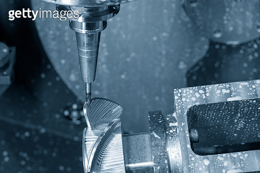 The 5-axis machining center cutting the boat propeller parts with solid ...