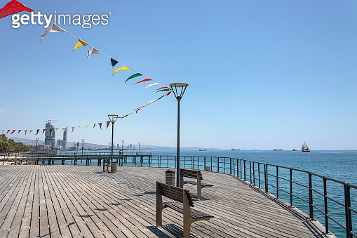 Sea pier with colorful flag garland, Limassol, Cyprus (1408060719) - 게티 ...