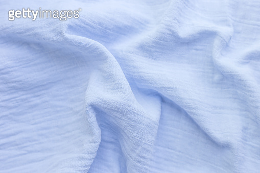 Blue wavy cotton fabric texture. Baby textiles, baby diaper. Baby sheet ...