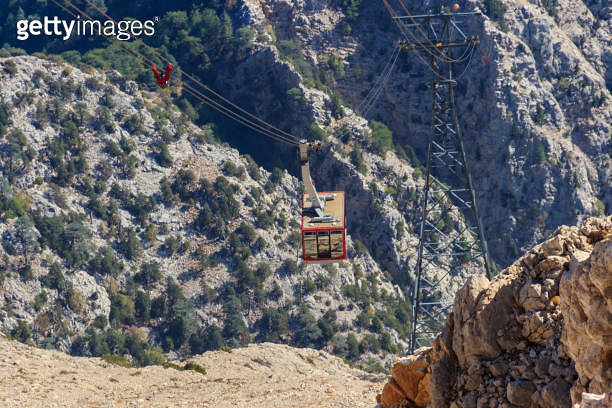 Cable car on ropeway leading to a top of Tahtali mountain in Antalya ...