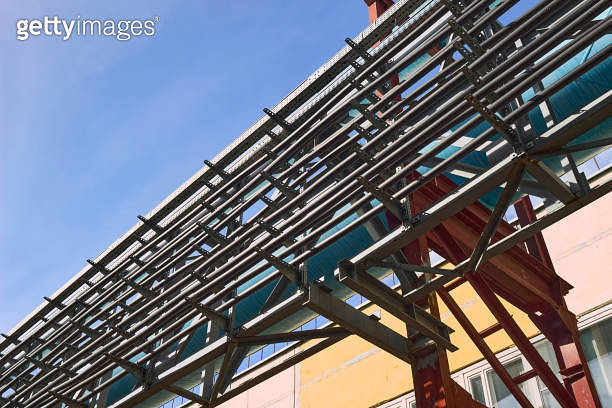 Cable route on steel and reinforced concrete supports. Rows of parallel ...