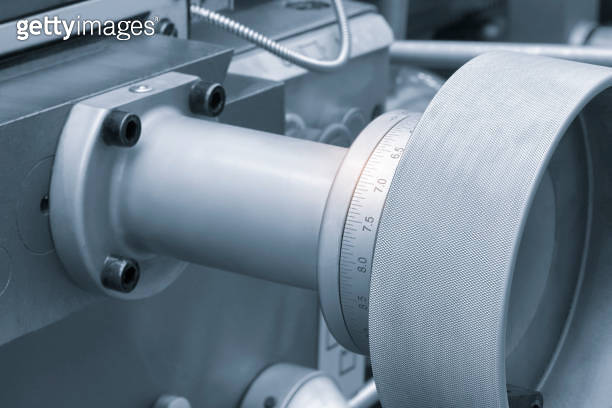 Lathe control knobs close up blue tone. Metal machine tools industry ...