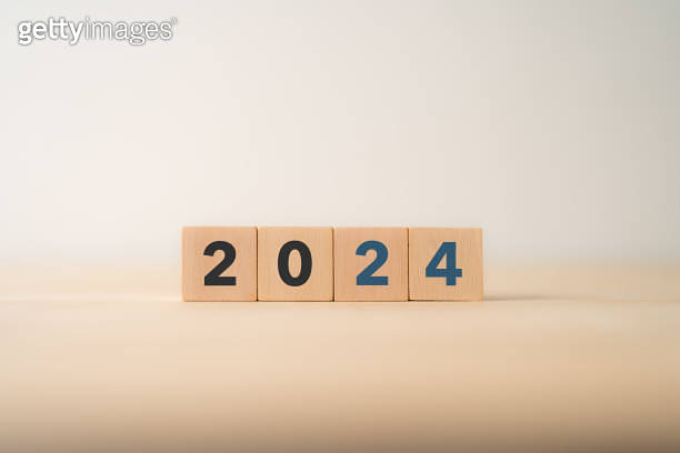 Starting new year 2024. 2024 on wooden cube blocks. Beginning and start ...
