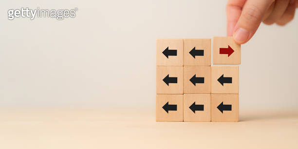 New ways of working, differentiation strategy concept symbol on wood ...