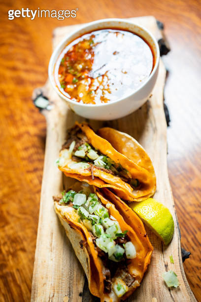 Authentic taste of Mexico with street tacos filled with birria, carne ...