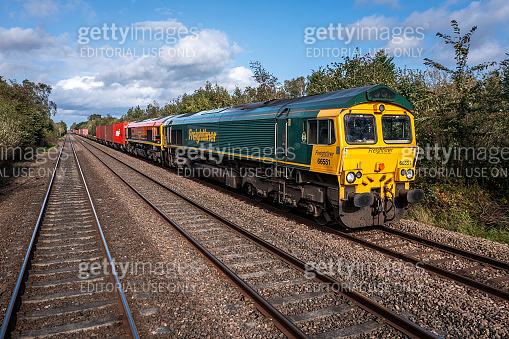 Two Freightliner Intermodal Class 66 locomotives hauling an Intermodal ...