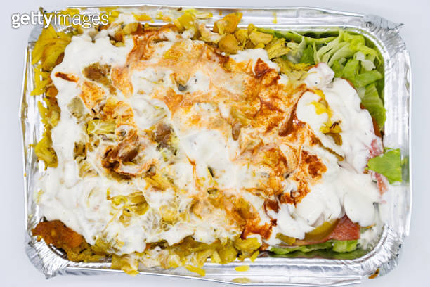 Overhead View of a Delicious Chicken Over Rice Halal Platter with White ...