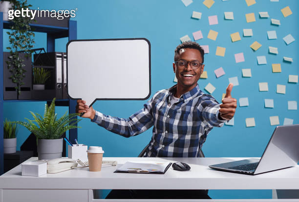 Happy smiling finance department team leader with cardboard speech ...
