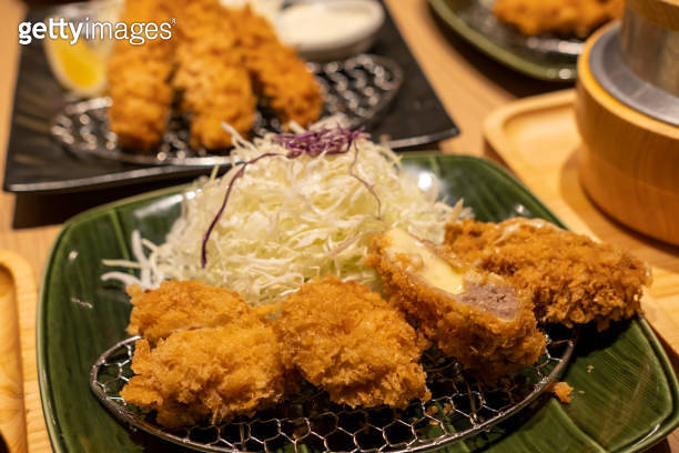 Cheese tonkatsu pork cutlet with rice and vegetable set, soft focus ...