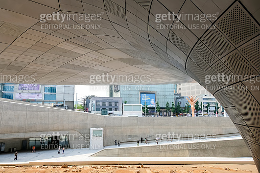 Walkway and Perforated facade cladding of Dongdaemun Design Plaza or ...