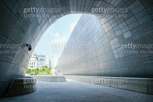 Walkway and Perforated facade cladding of Dongdaemun Design Plaza or ...
