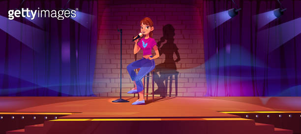 Female stand-up comedian performing on stage 이미지 (1475232998) - 게티이미지뱅크