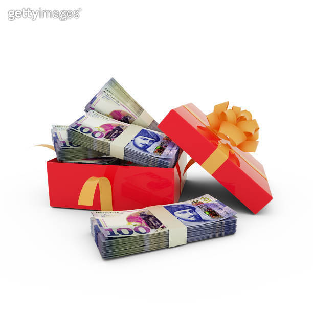 Stack of Georgian lari notes inside an open red gift box. Bundles of ...