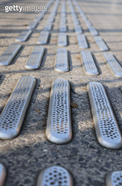 Stainless steel Tactile paving with textured ground surface on the side ...
