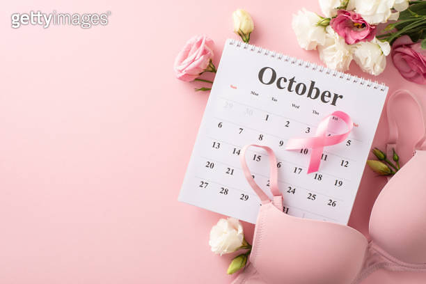 Pink-themed health design. Top view arrangement of October calendar ...